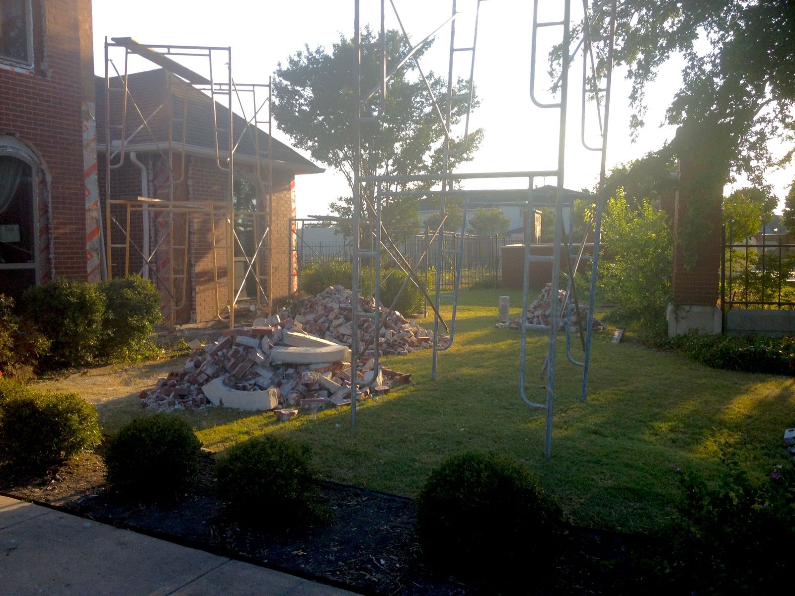 Our large overgrown yard met its match! DIY frontyard landscape.